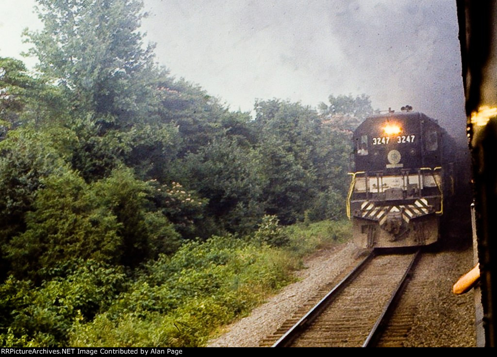SR SD40-2 3247 passes SR 610 and her train